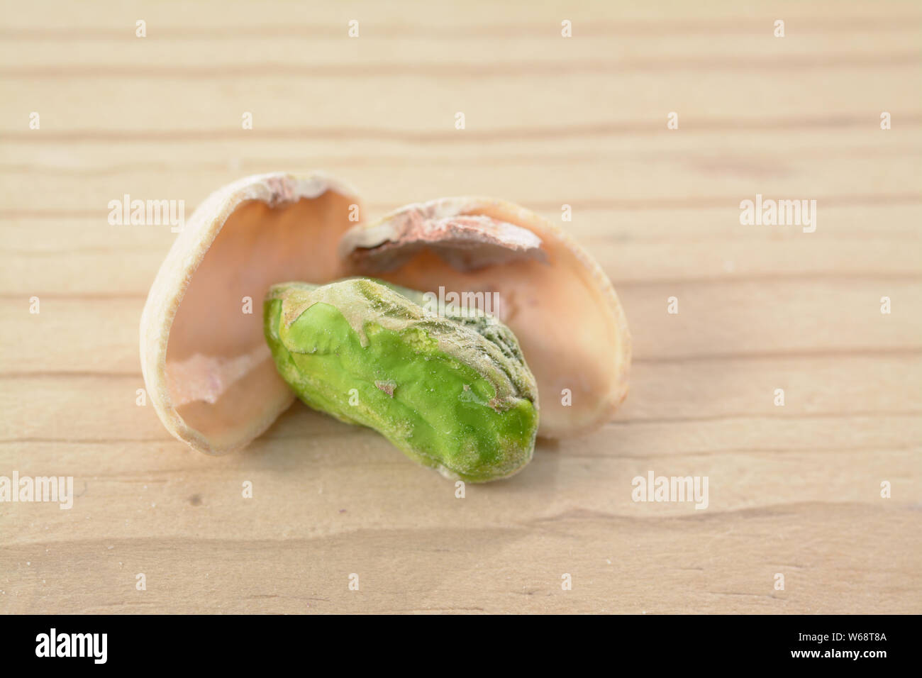 roasted and salty peeled pistachio nut in macro view Stock Photo - Alamy
