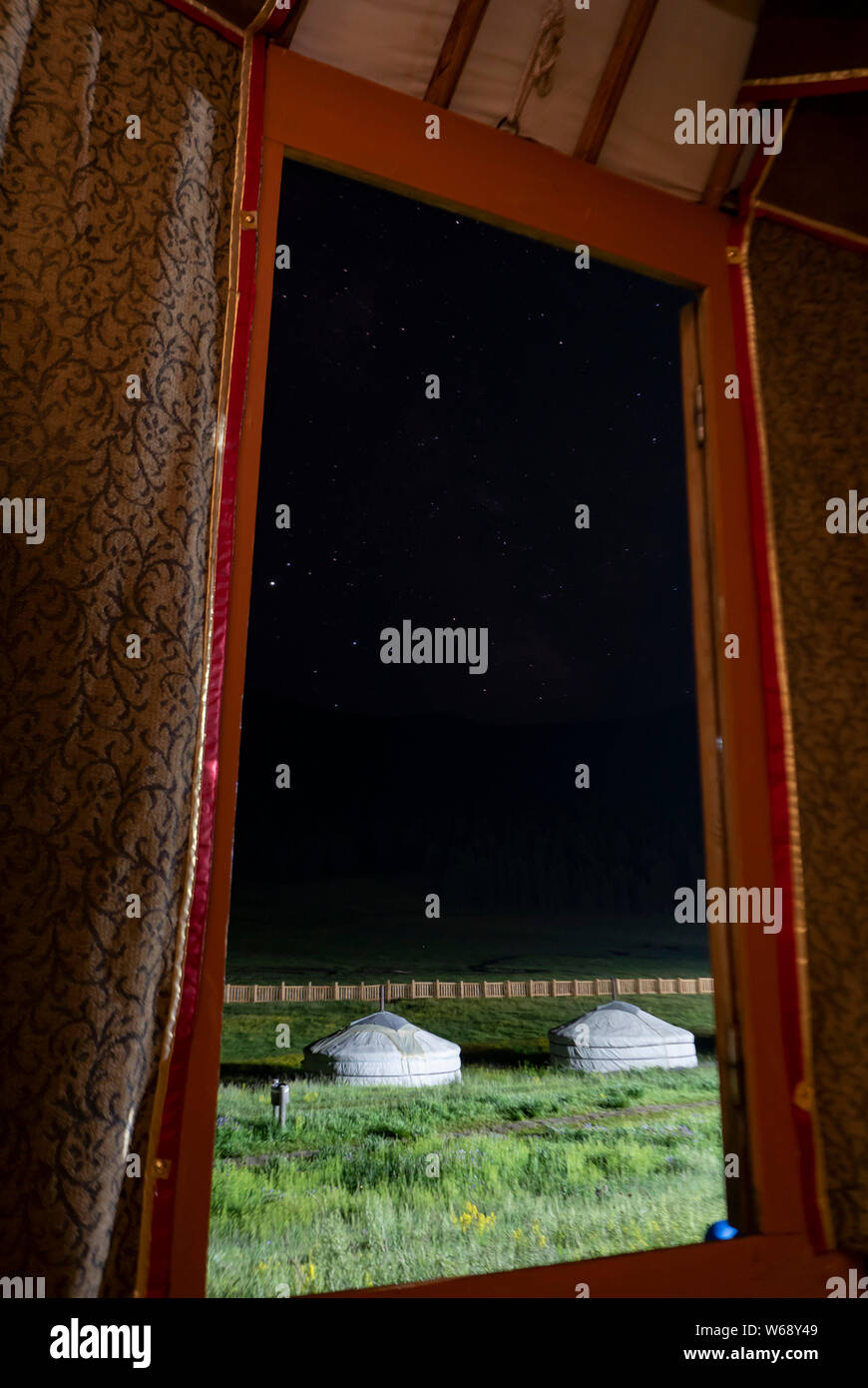 Mongolian Gers and starry sky view through the inside of a Mongolian ...