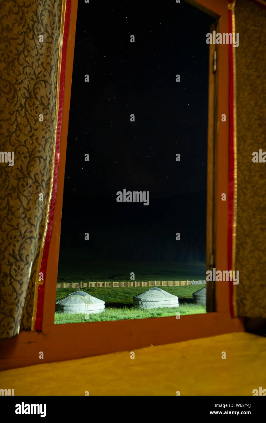 Mongolian Gers and starry sky view through the inside of a Mongolian ...