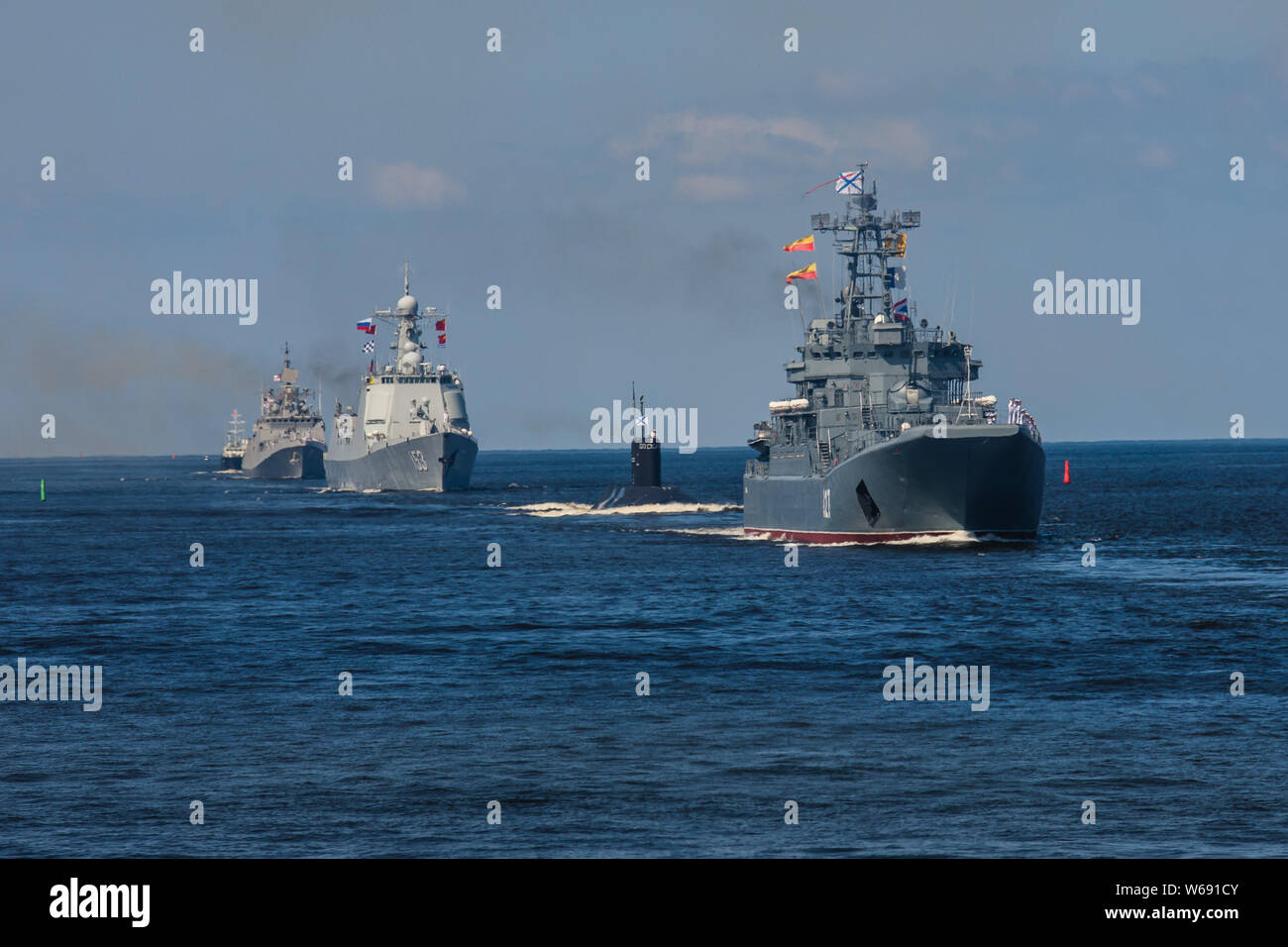 A line ahead of modern russian military naval battleships warships in ...