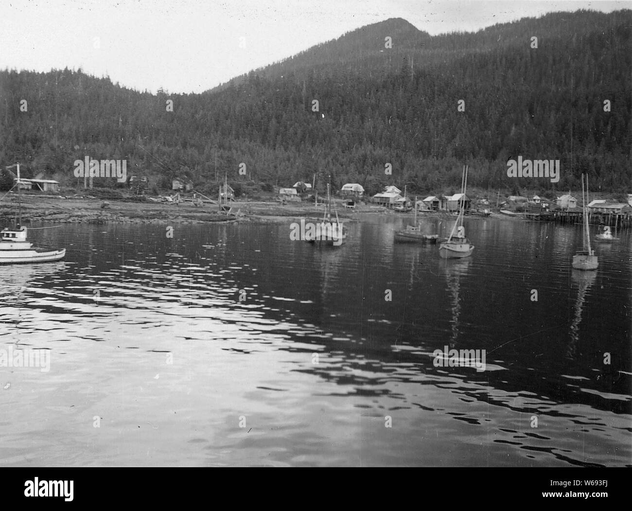 Boat in small harbor Black and White Stock Photos & Images - Alamy