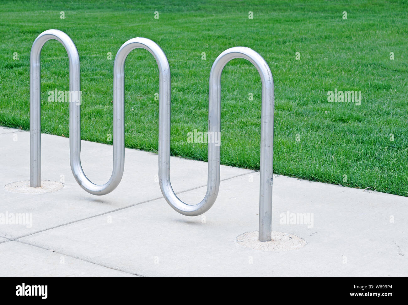 empty bicycle rack in the campus of college university Stock Photo - Alamy