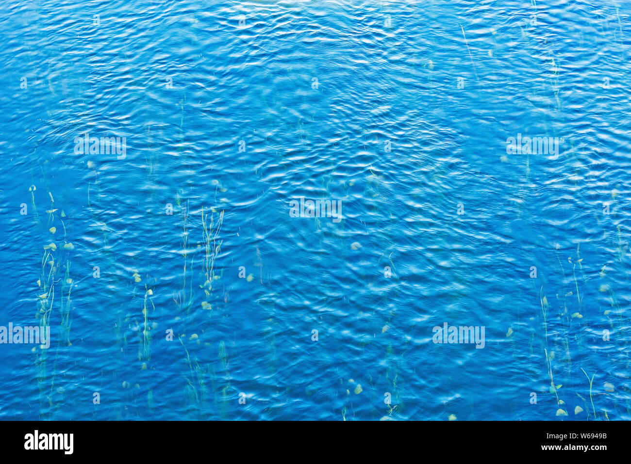 Surface of the lake with the crystal water Stock Photo - Alamy