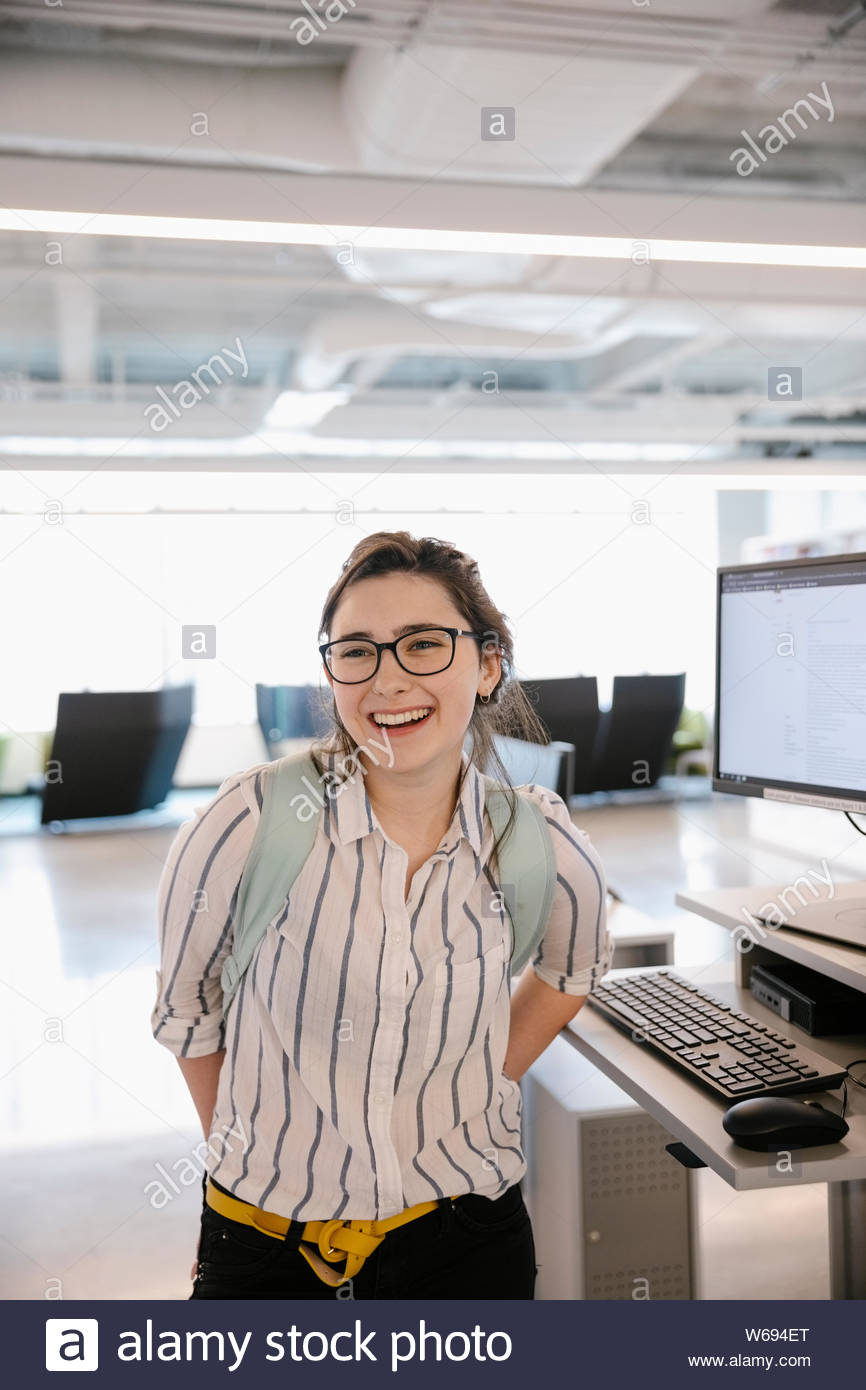 Portrait of cheerful student smiling towards camera Stock Photo - Alamy