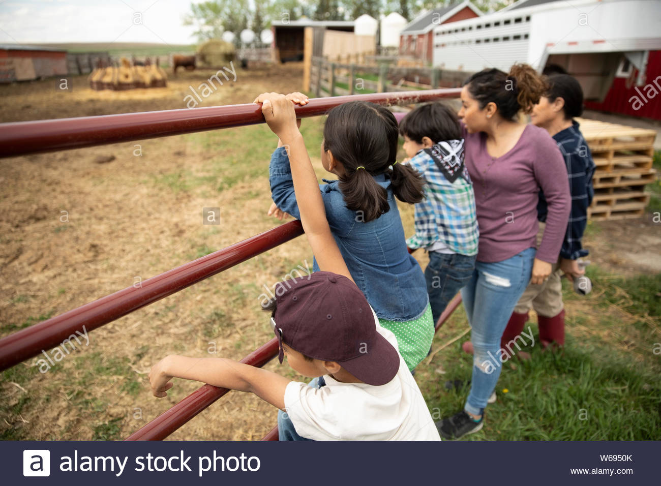 Four children standing hi-res stock photography and images - Alamy