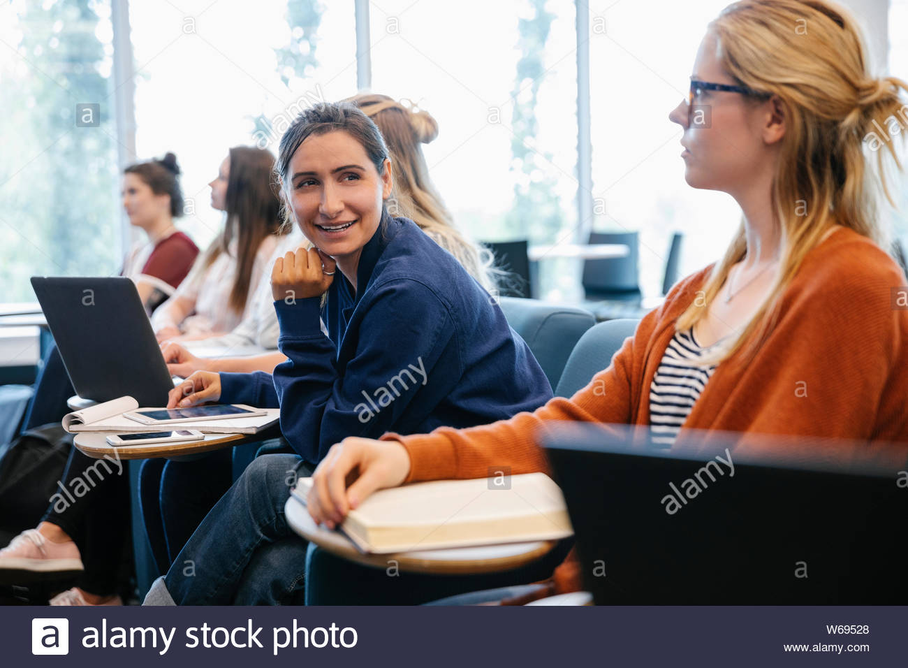 Lecture smiling classroom hi-res stock photography and images - Alamy