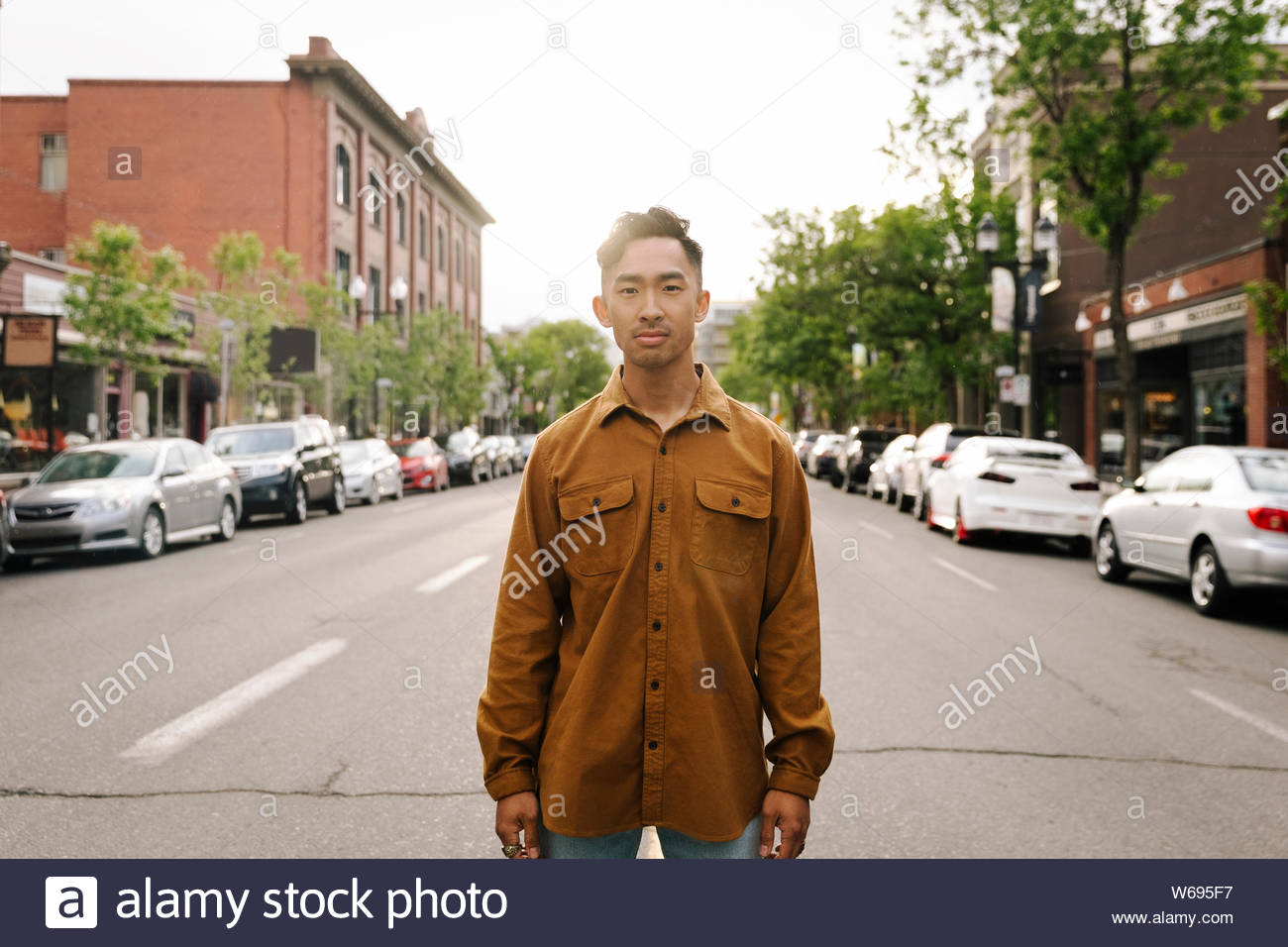 Middle part hair men hi-res stock photography and images - Alamy