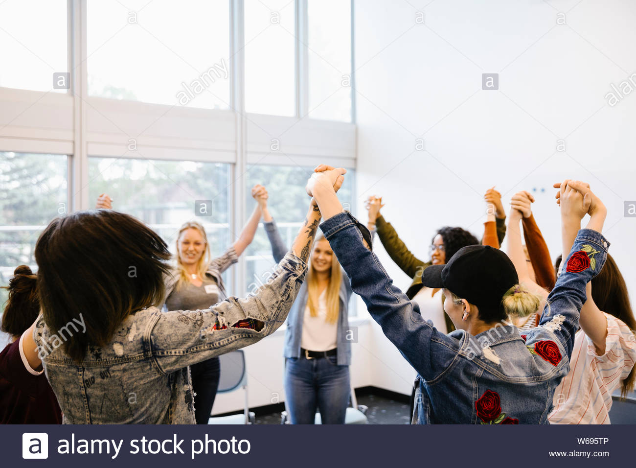 Raised hands classroom hi-res stock photography and images - Alamy