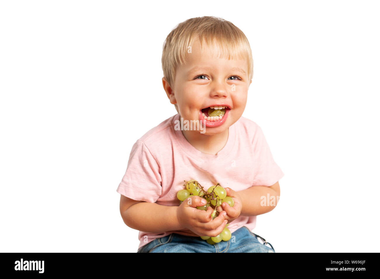 Boy eating grapes child hi-res stock photography and images - Alamy