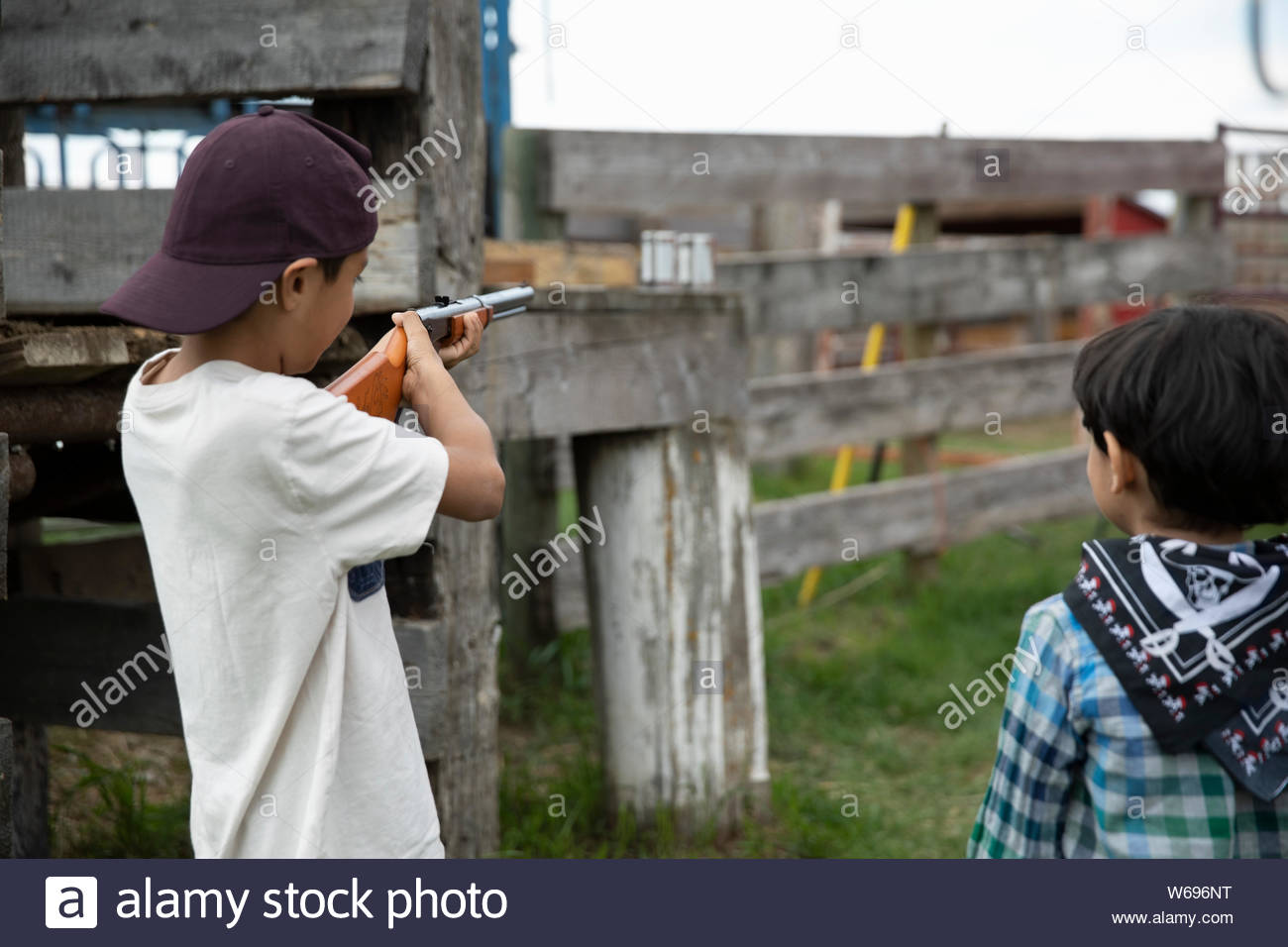 Boy aiming gun hi-res stock photography and images - Alamy