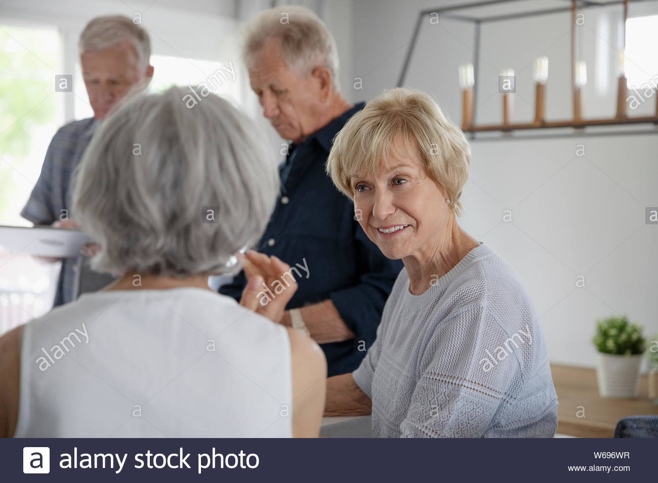 Elderly women talking together hi-res stock photography and images - Alamy