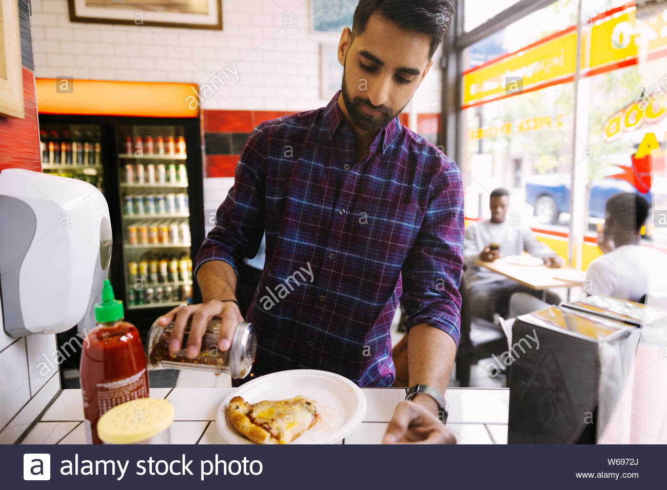 Man eating chili pepper hi-res stock photography and images - Alamy