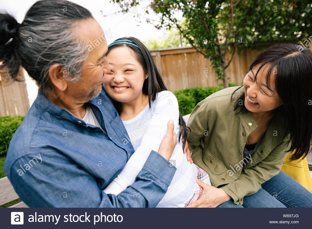 Down syndrome child and parent hi-res stock photography and images - Alamy