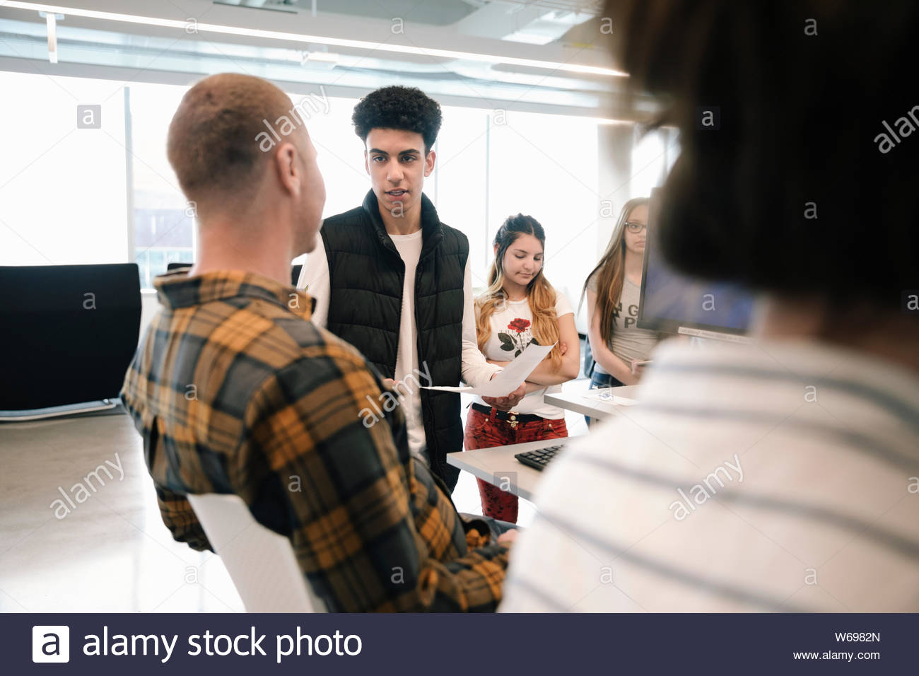 Student librarian talking hi-res stock photography and images - Alamy
