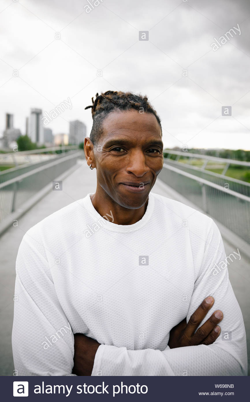 Runner arms up man hi-res stock photography and images - Alamy