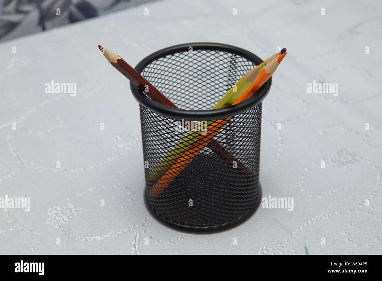 Box for pens and pencils . Colored pencils in a pencil case on white ...