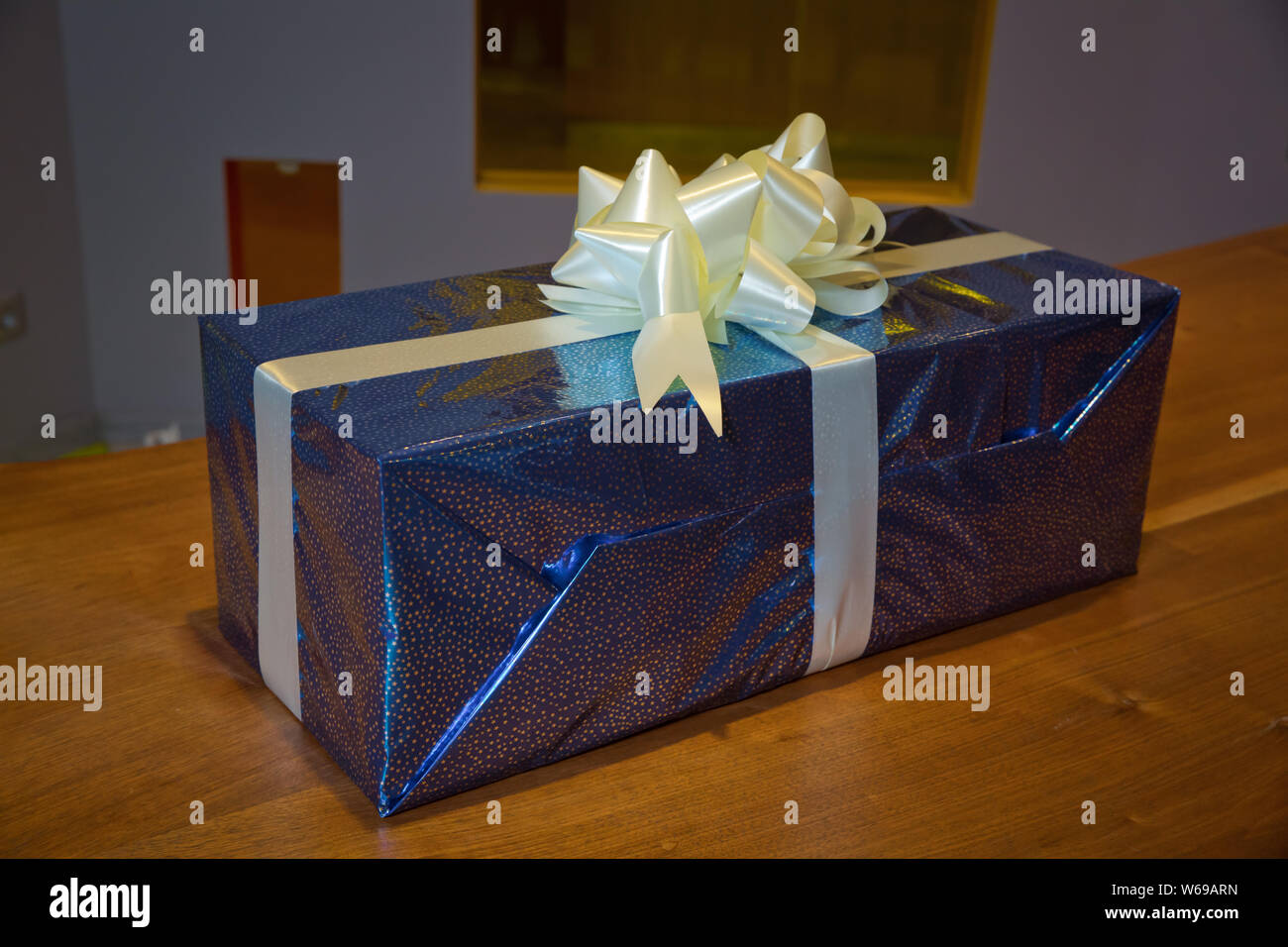 Blue gift with a white ribbon - christmas celebration image . blue gift ...