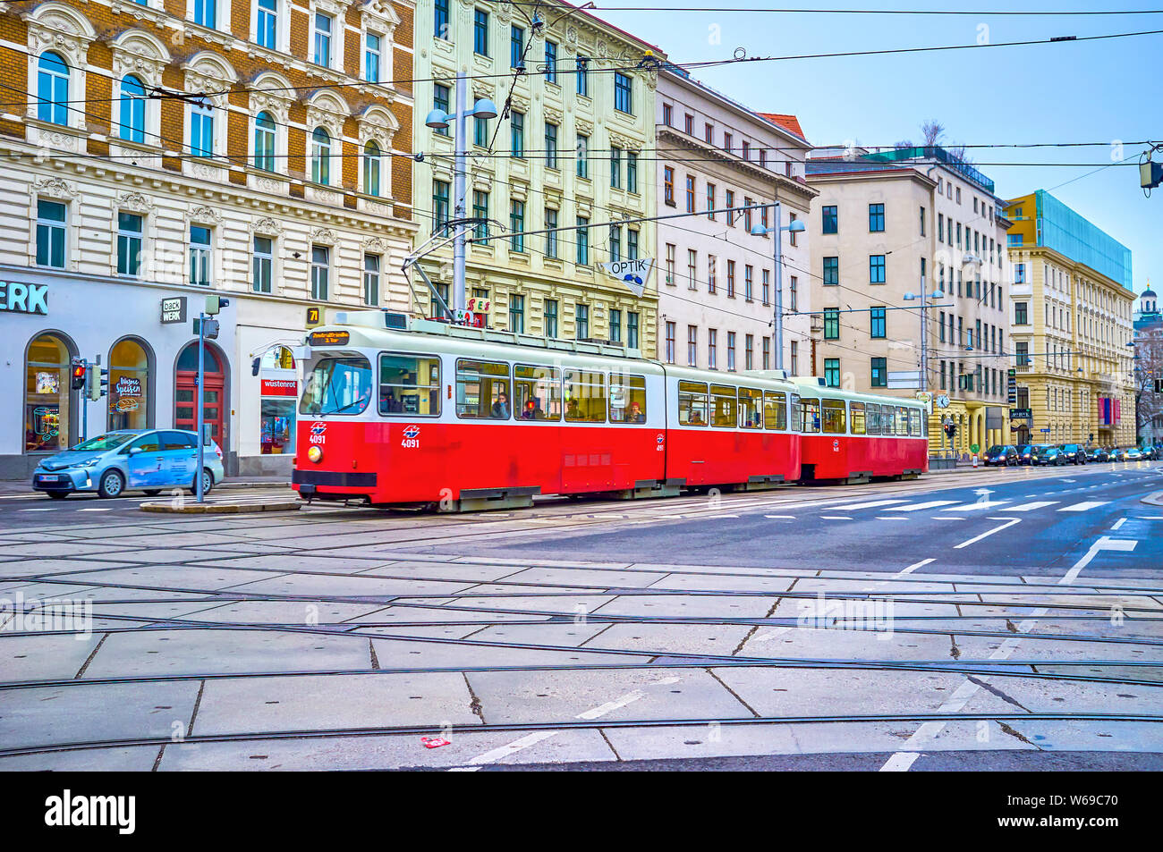 VIENNA, AUSTRIA - MARCH 2, 2019: The red tram rides along the street ...