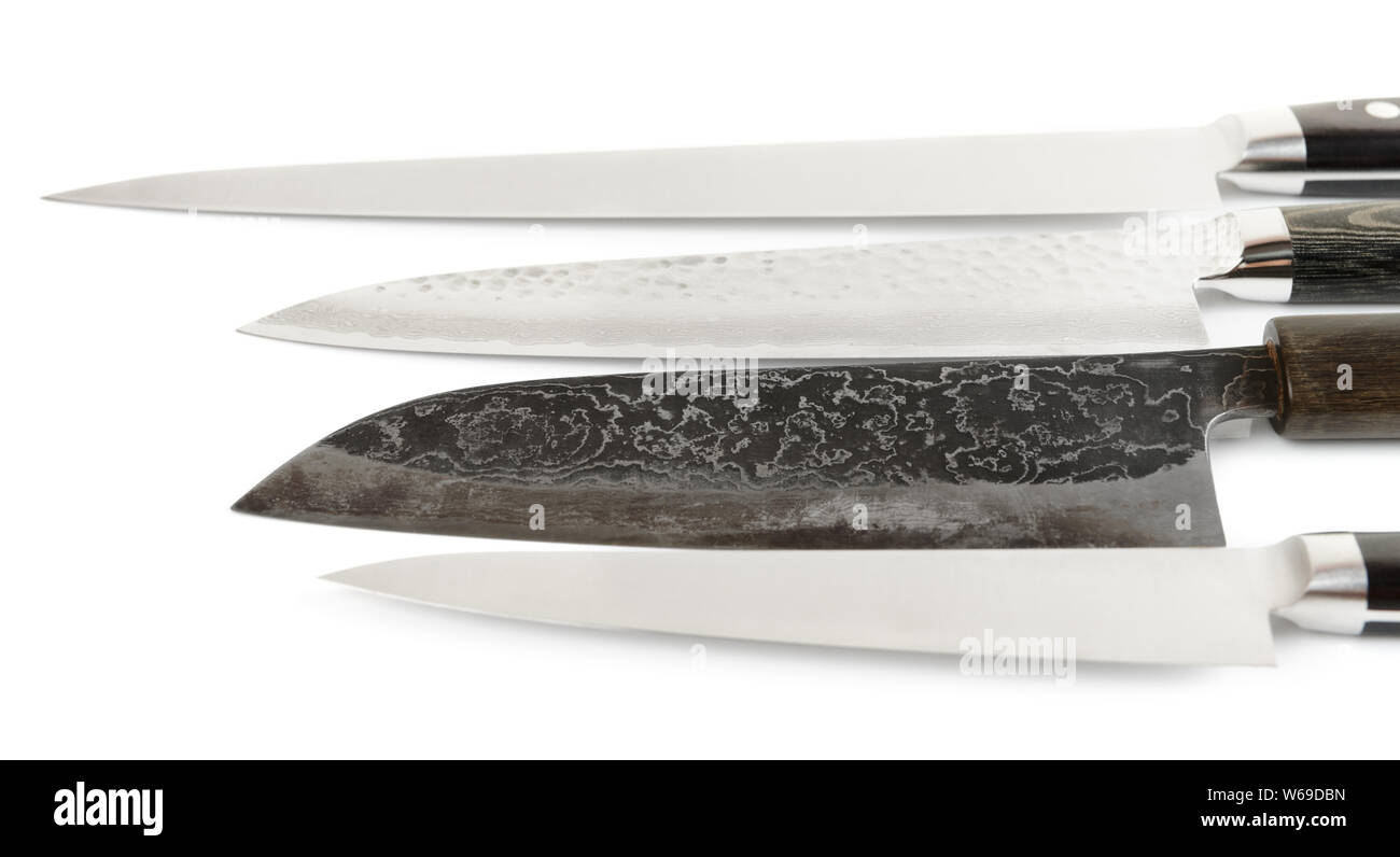 Four knife blades isolated on white background Stock Photo - Alamy