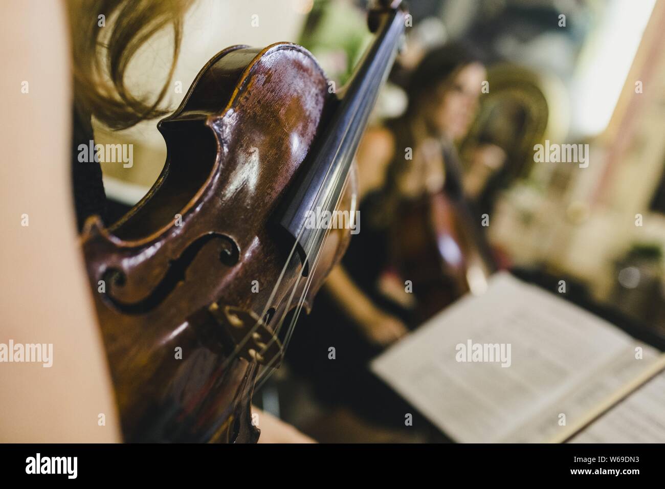 Hold the instrument hi-res stock photography and images - Alamy