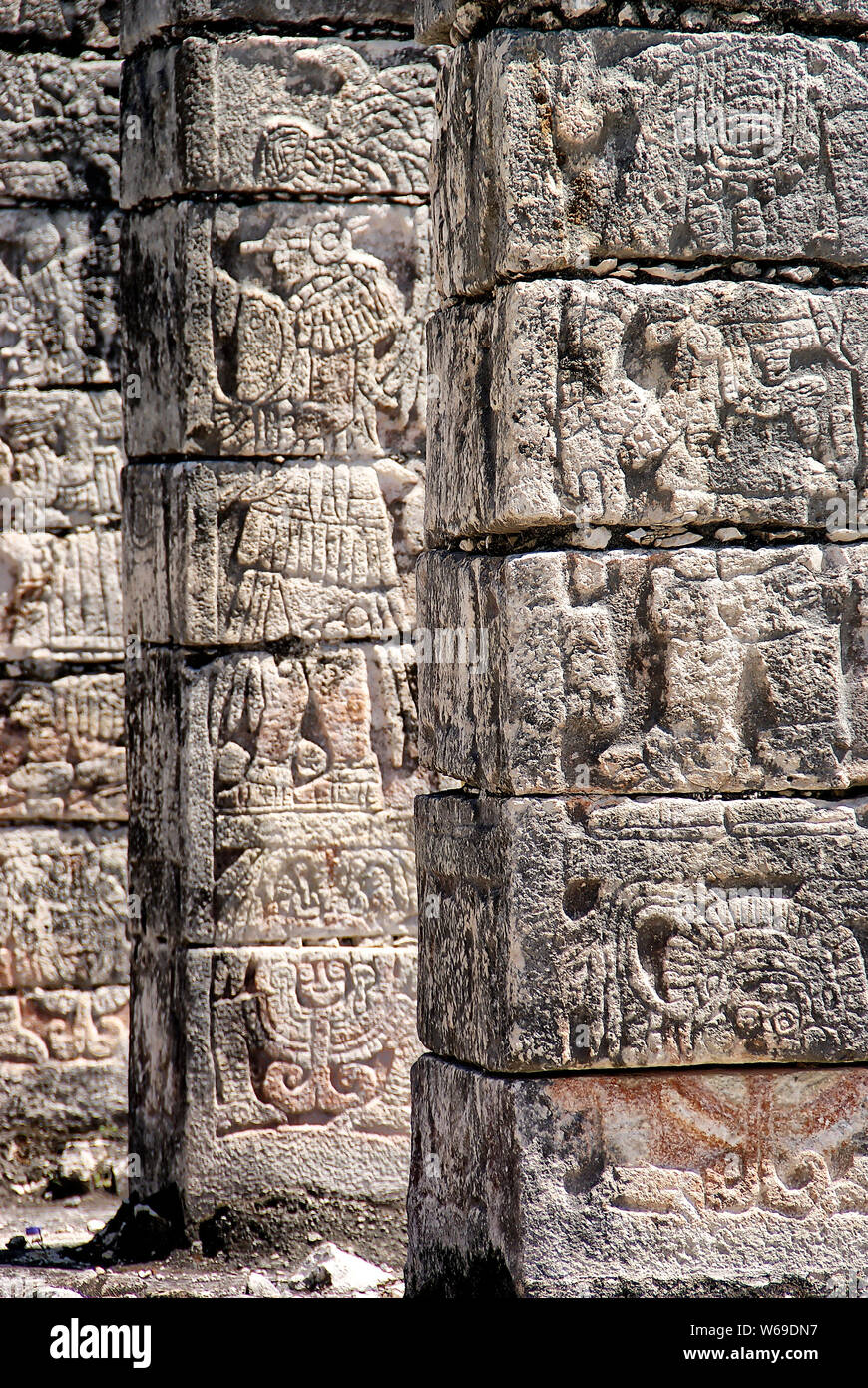Carved stone columns with Mayan images in Chichen Itza, Mexico Stock ...