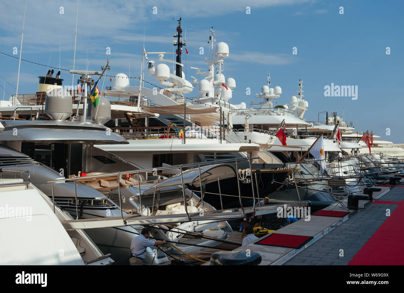Yachts and ships in the port of Monaco pier pier boats sails and ...