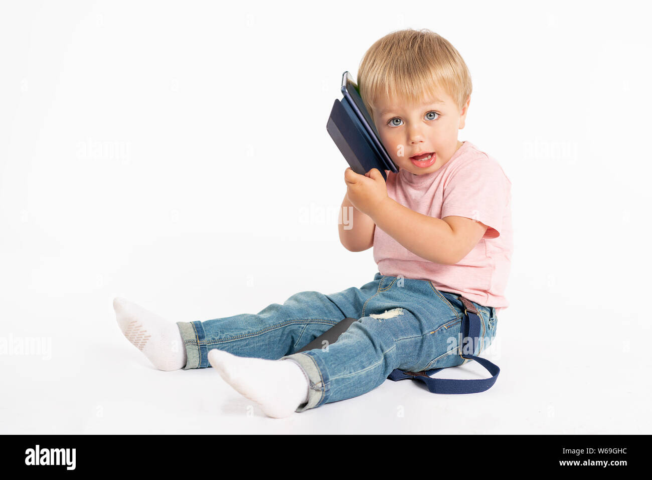 Little boy using mobile phone. Child playing on smartphone. Technology ...