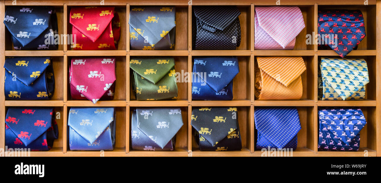 View of different colors ties in the showcase Stock Photo - Alamy