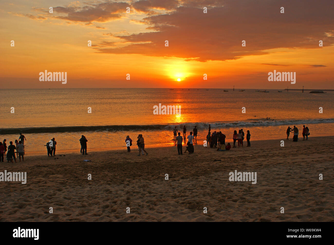 Sunset at Jimbaran Beach, Bali, Indonesia Stock Photo - Alamy