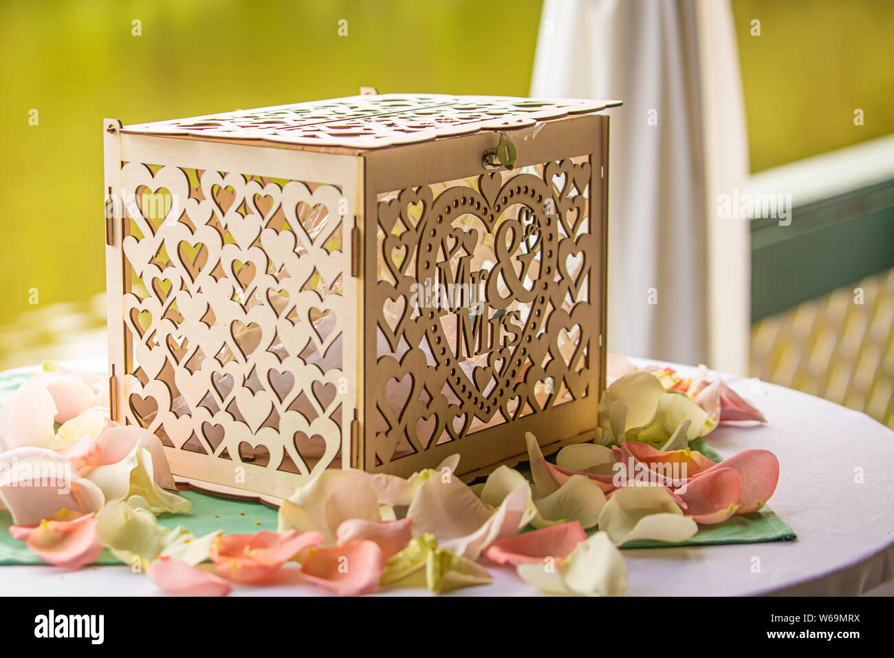 Wedding gift donation box on the table summer day Stock Photo - Alamy