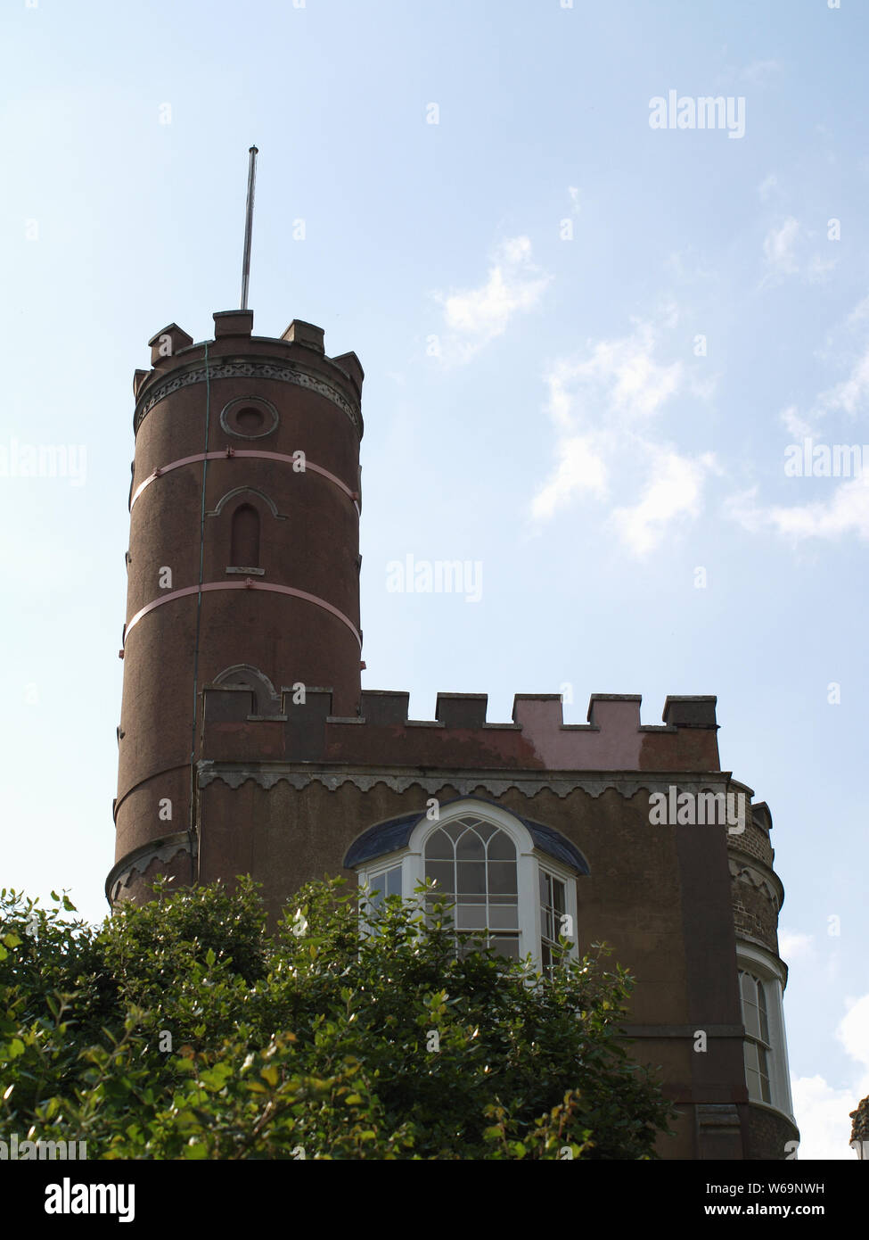 Luttrell's Tower, a 3 story stuccoed yellow brick folly at Calshot ...