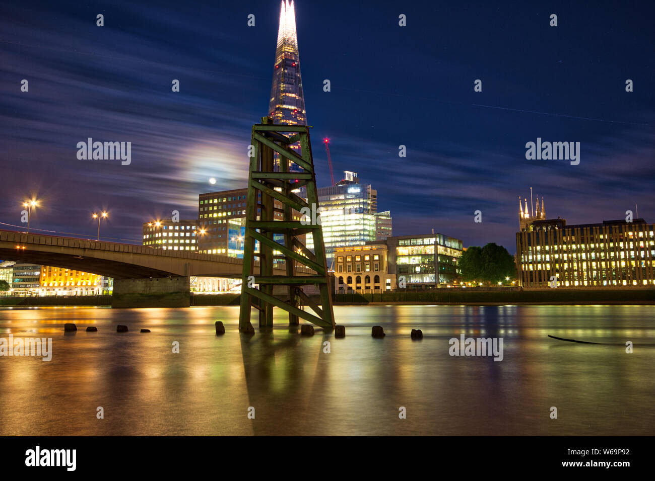 Full moon over london skyline at summer night hi-res stock photography ...