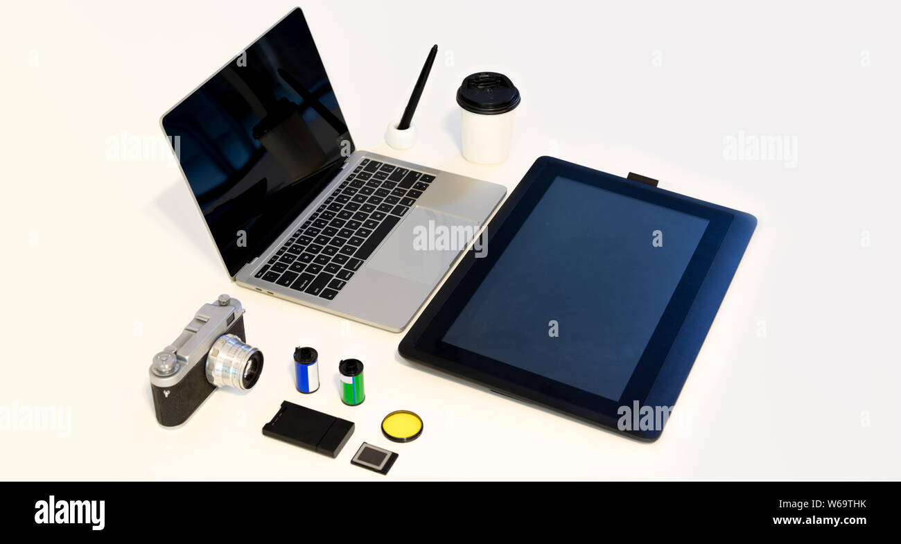 Professional photographer's tools with copy space on white background ...