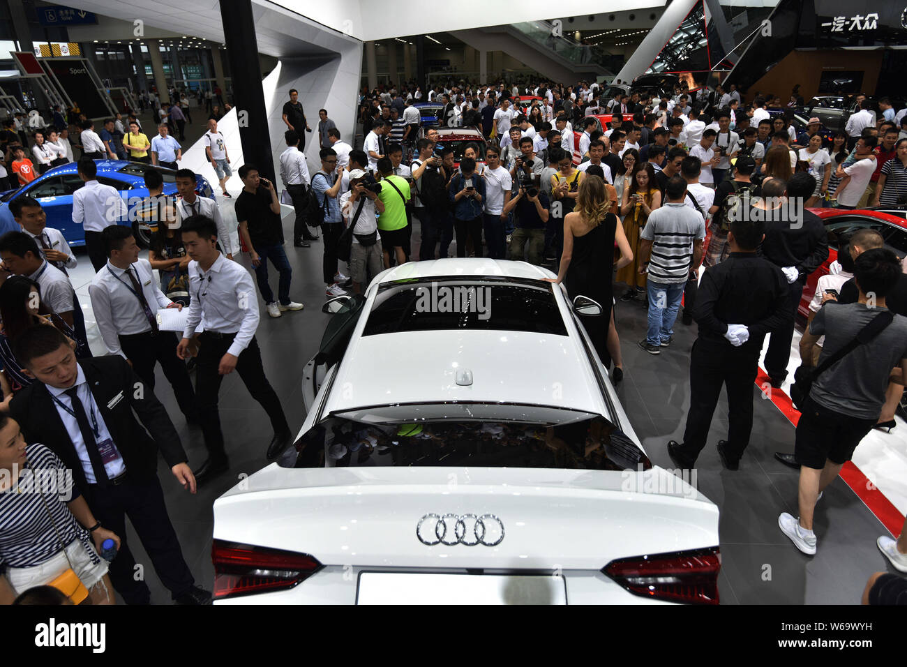Visitors crowd the stand of Audi during the 22nd Shenzhen-Hong Kong ...