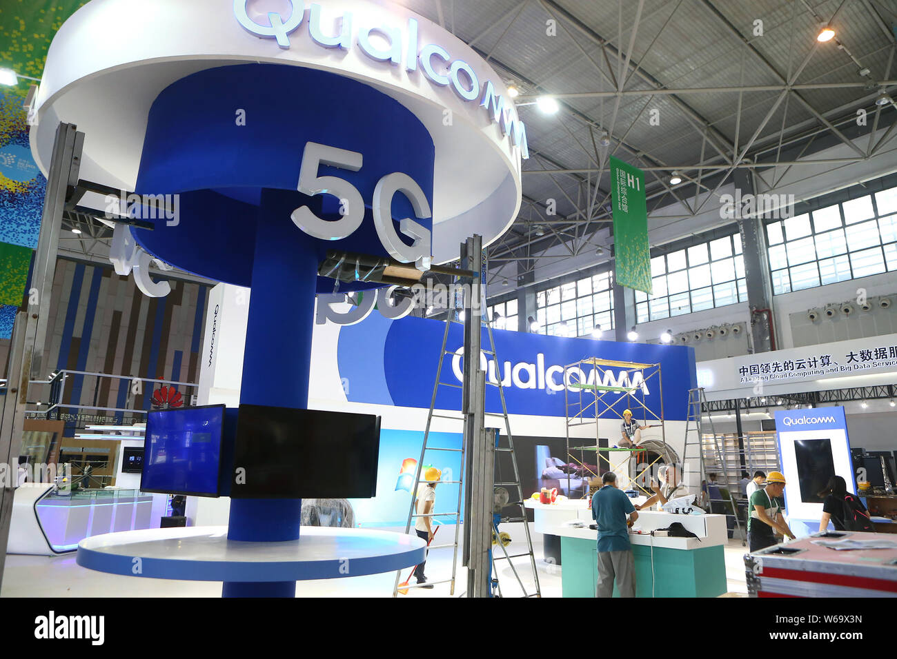 --FILE--View of a 5G logo at the stand of Qualcomm before the 2018 ...