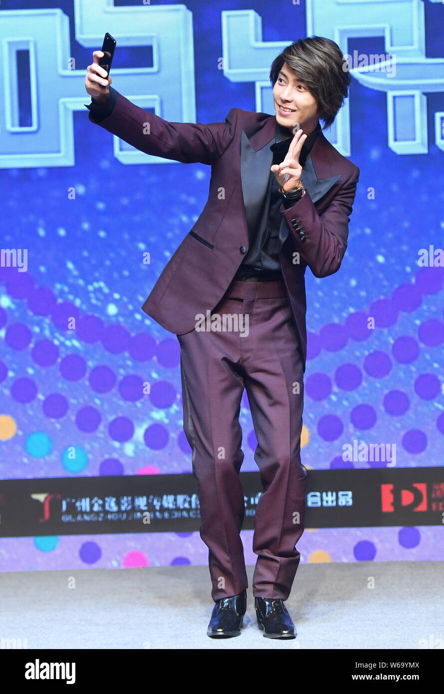 Japanese actor and singer Tomohisa Yamashita, also widely known as Yamapi, attends a press ...