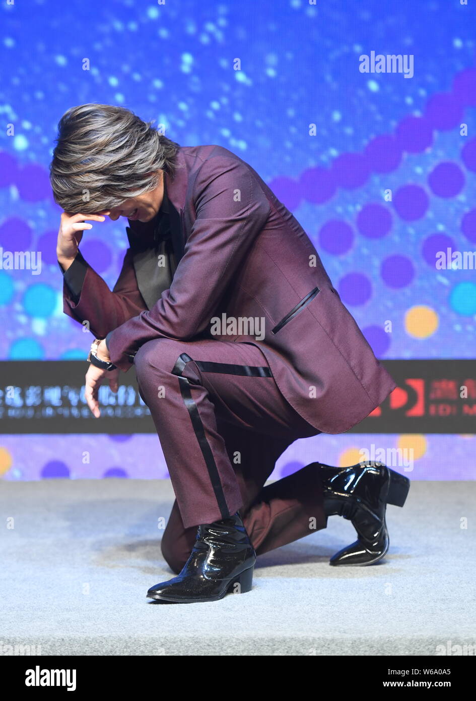 Japanese actor and singer Tomohisa Yamashita, also widely known as Yamapi, attends a press ...