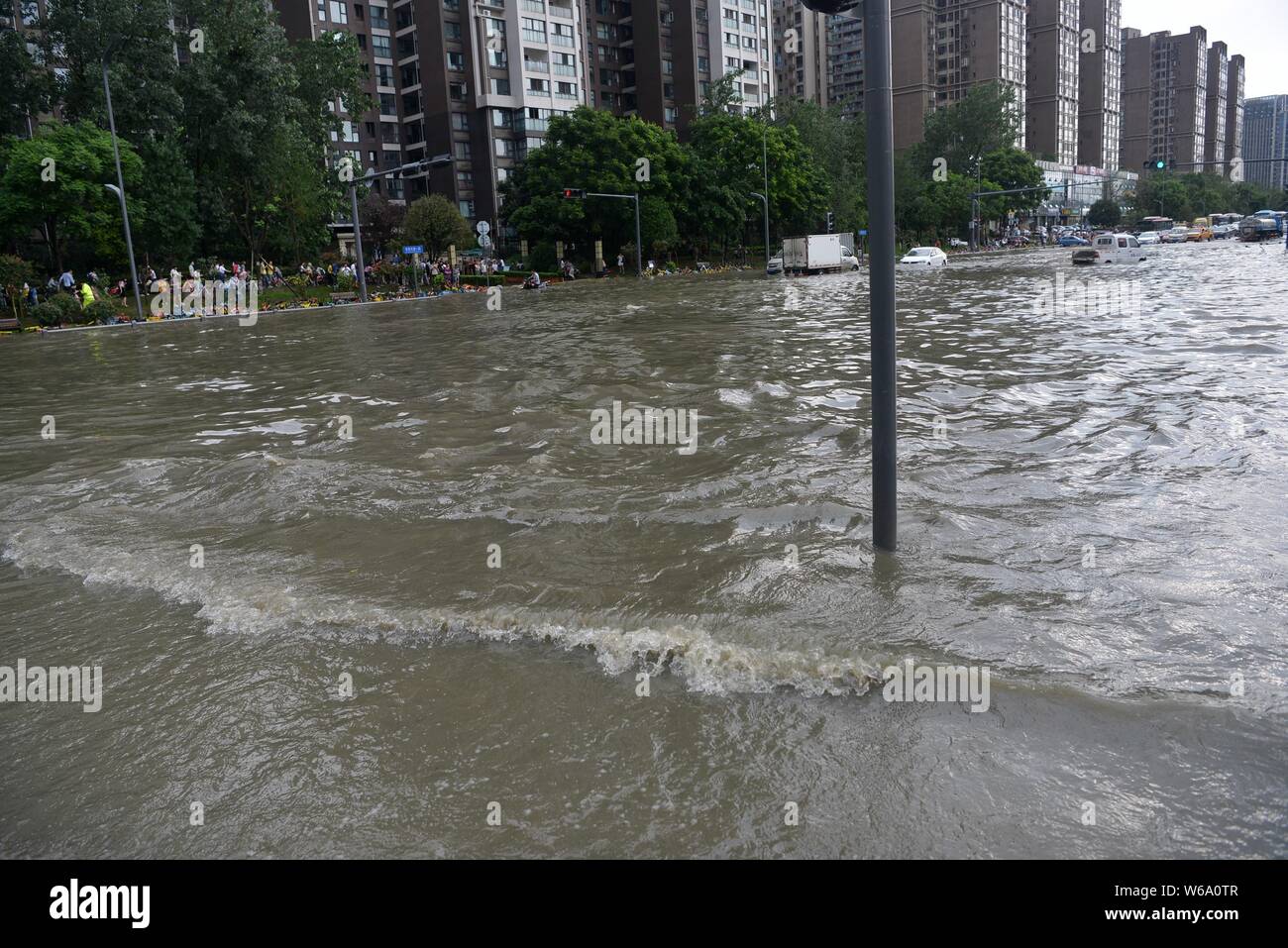 A road is flooded caused by a heavy rainstorm in Chengdu city ...
