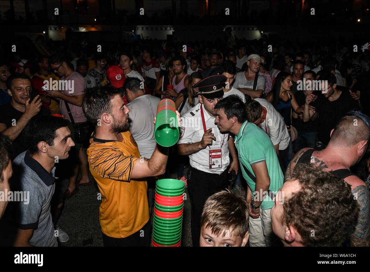 Football fans from the whole world build a human tower in order to ...
