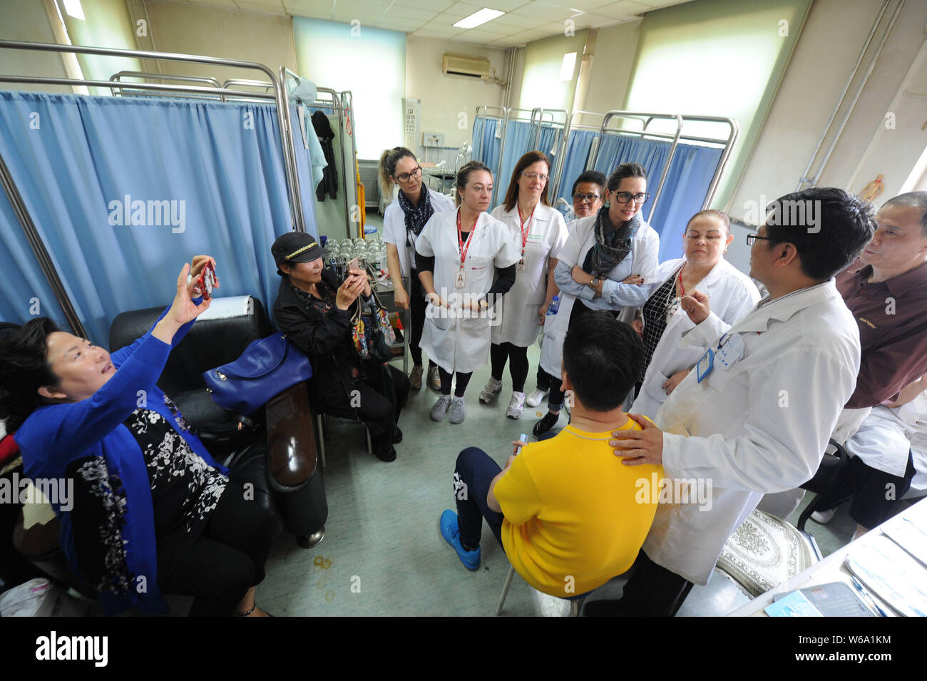 Doctor applying hi-res stock photography and images - Alamy