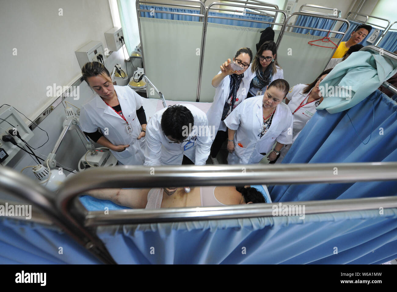 Doctor applying hi-res stock photography and images - Alamy