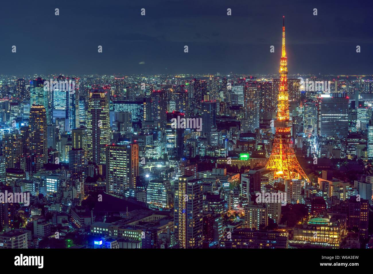 Beautiful aerial shot of modern city architecture with an illuminated ...