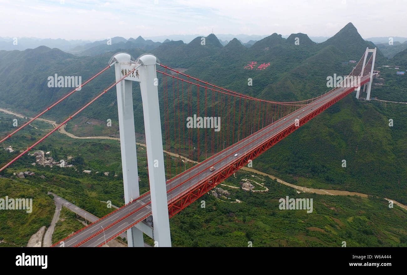 Aerial view of the Baling River Bridge 370 meters high over a valley in ...