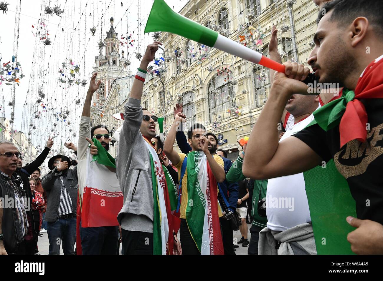 Local residents, football fans and tourists from all over the world ...