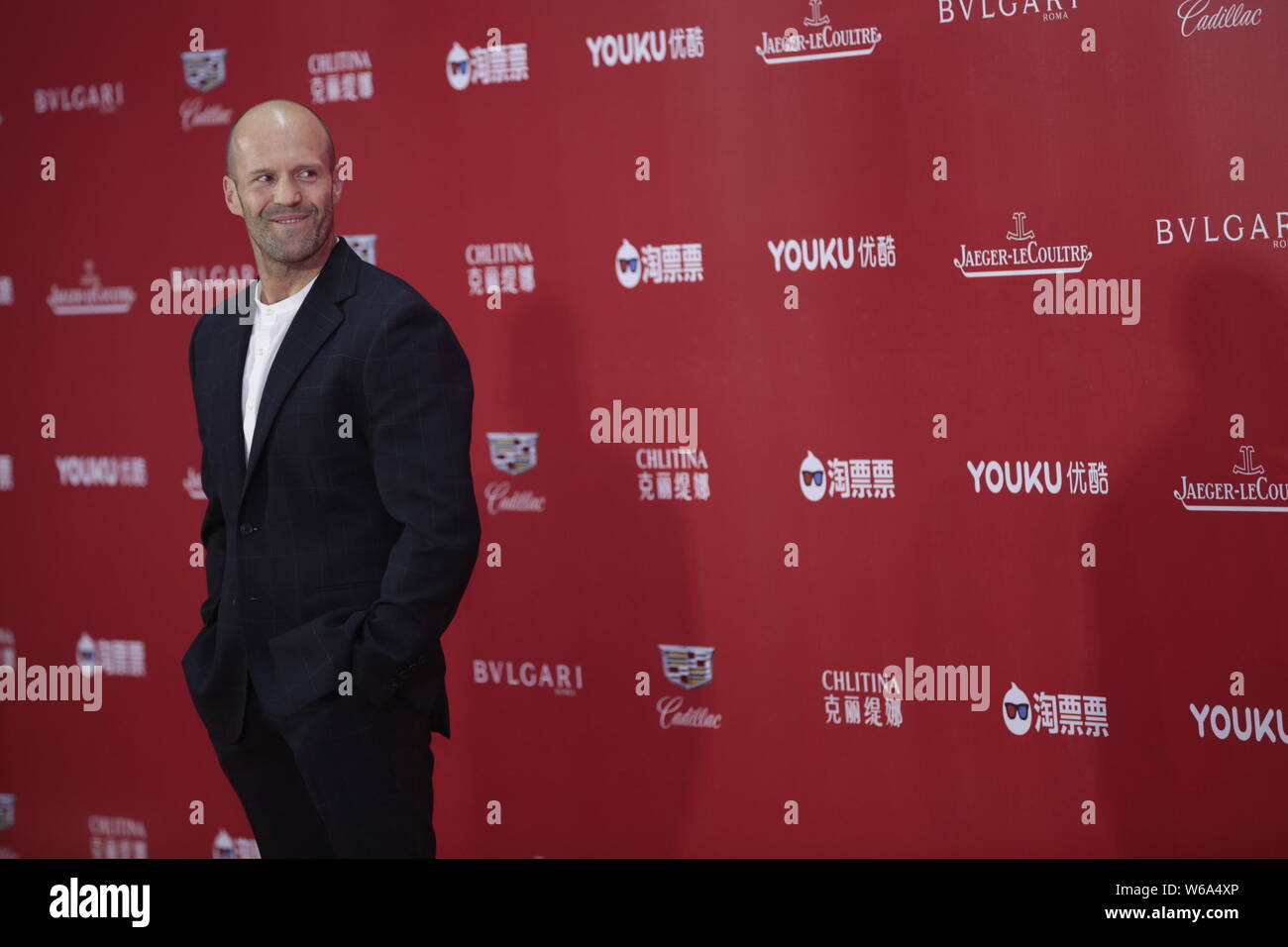 English actor Jason Statham poses as he arrives on the red carpet for ...