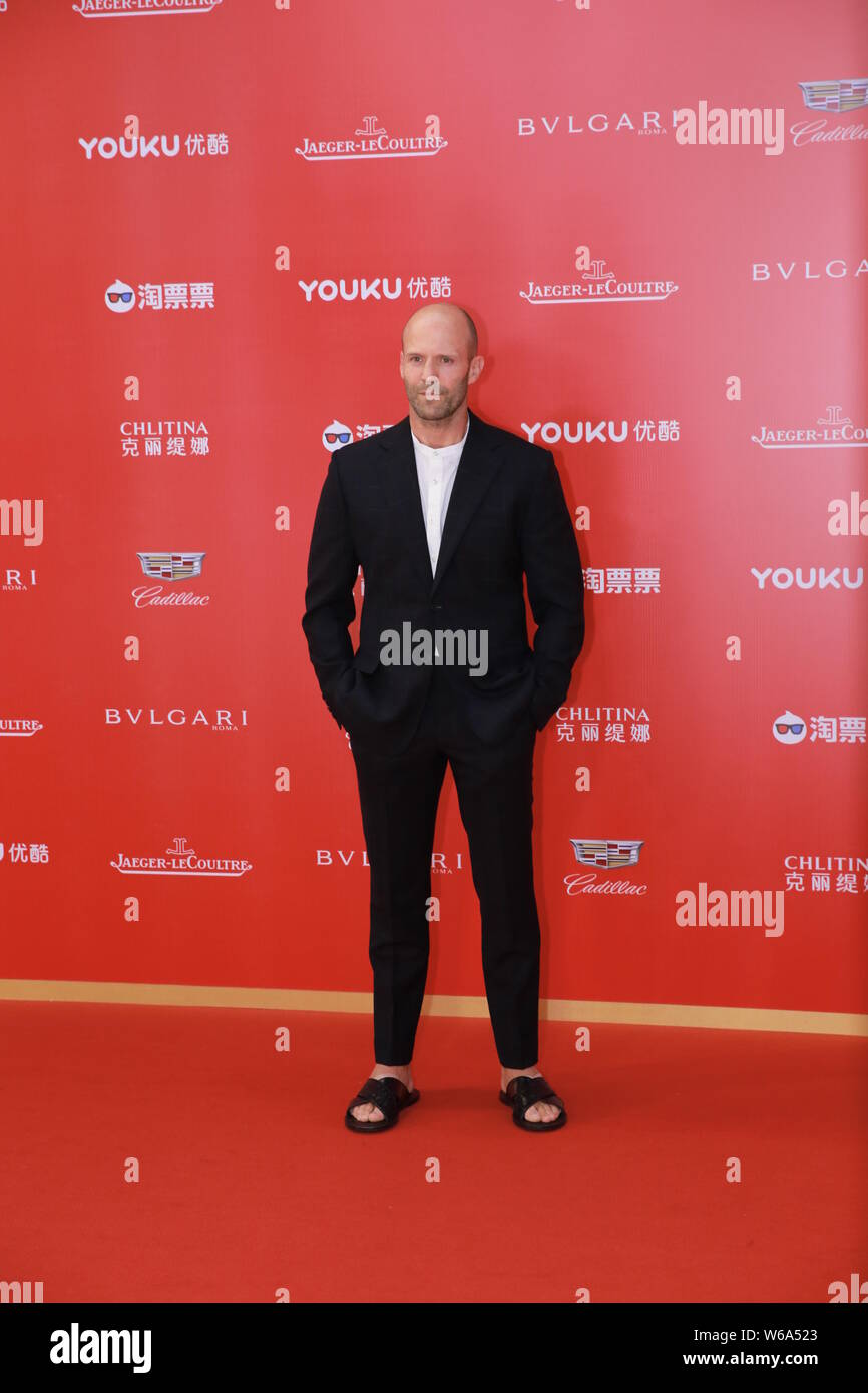 English actor Jason Statham poses as he arrives on the red carpet for ...