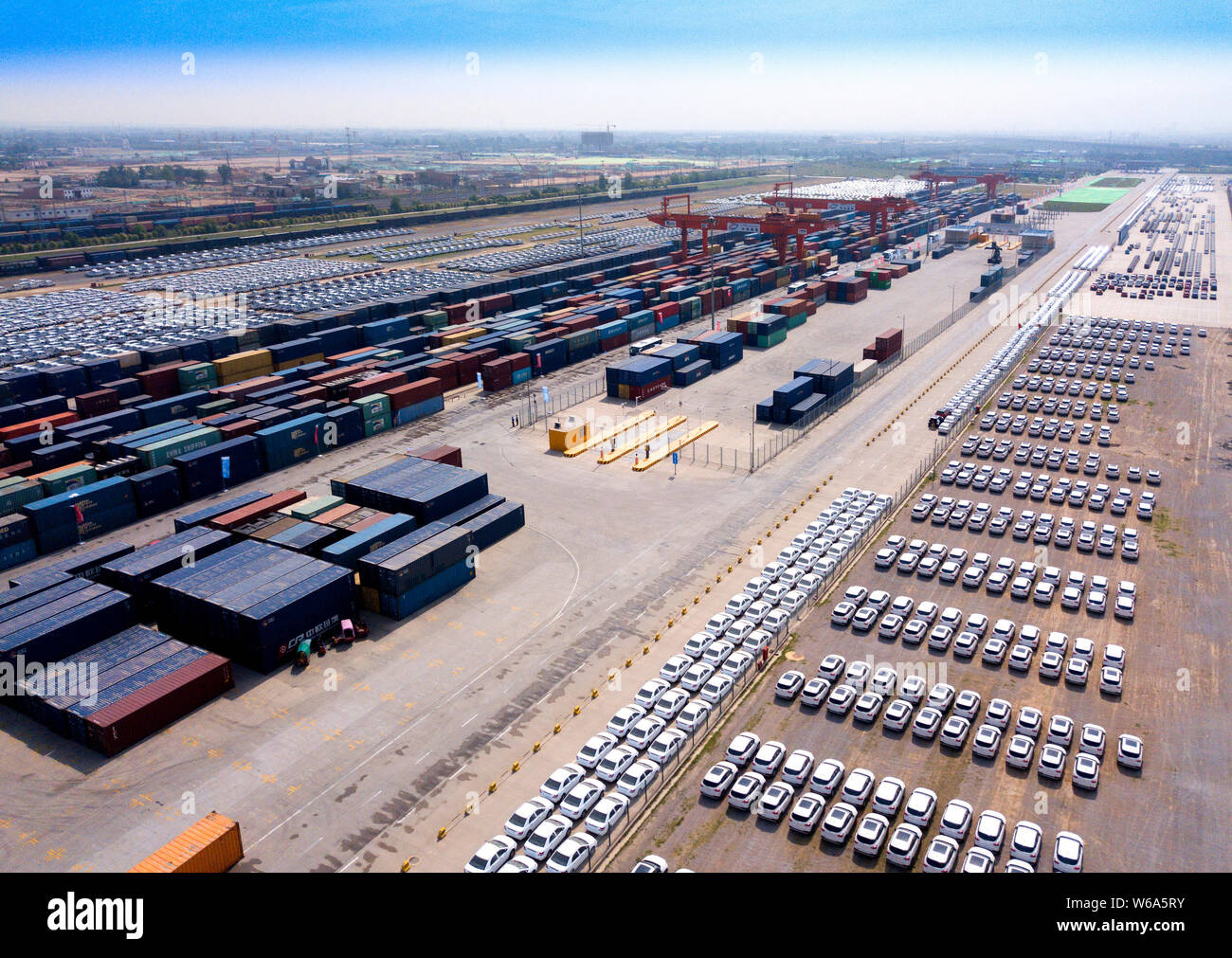 Cargo containers and cars shipped by The Volvo finished vehicle import ...