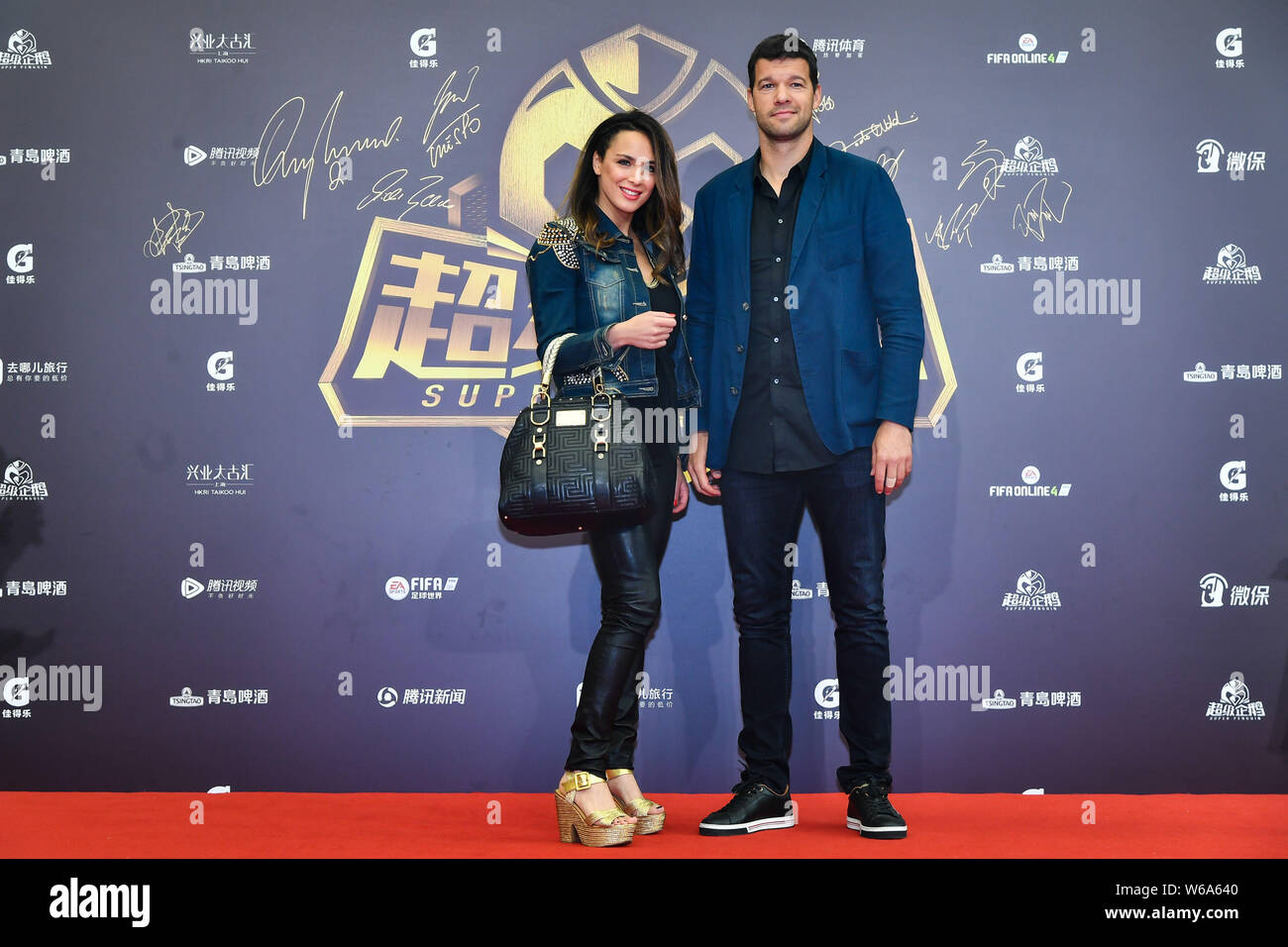German former player Michael Ballack, right, and his girlfriend Natacha ...