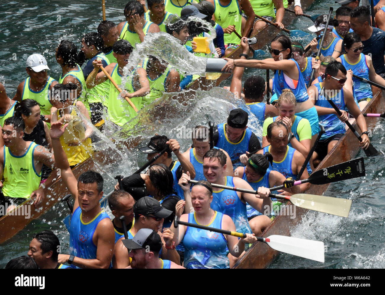 Participants compete in a dragon boat race held to celebrate the Dragon ...