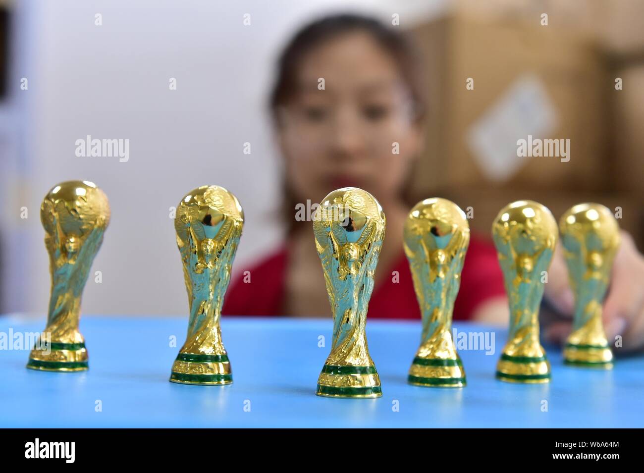 Licensed souvenirs of miniature World Cup Trophy for the 2018 FIFA ...
